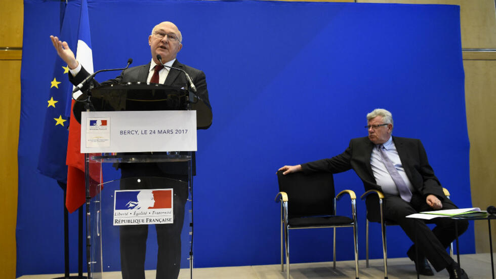 French deficit below 3 percent of GDP for first time in decade