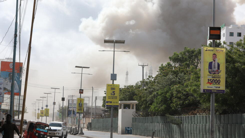 Scores killed in twin explosions at Somalia's education ministry
