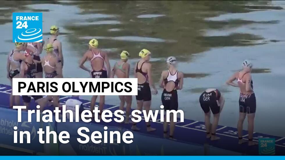 'What a special place to be in': Triathletes swim in the Seine ahead of ...