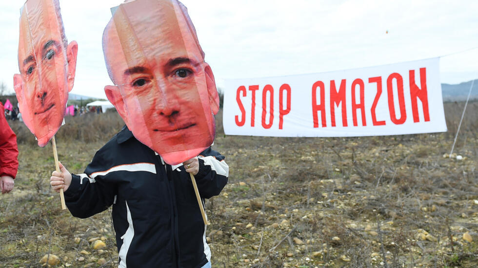 Hundreds rally in protest against Amazon expansion in France