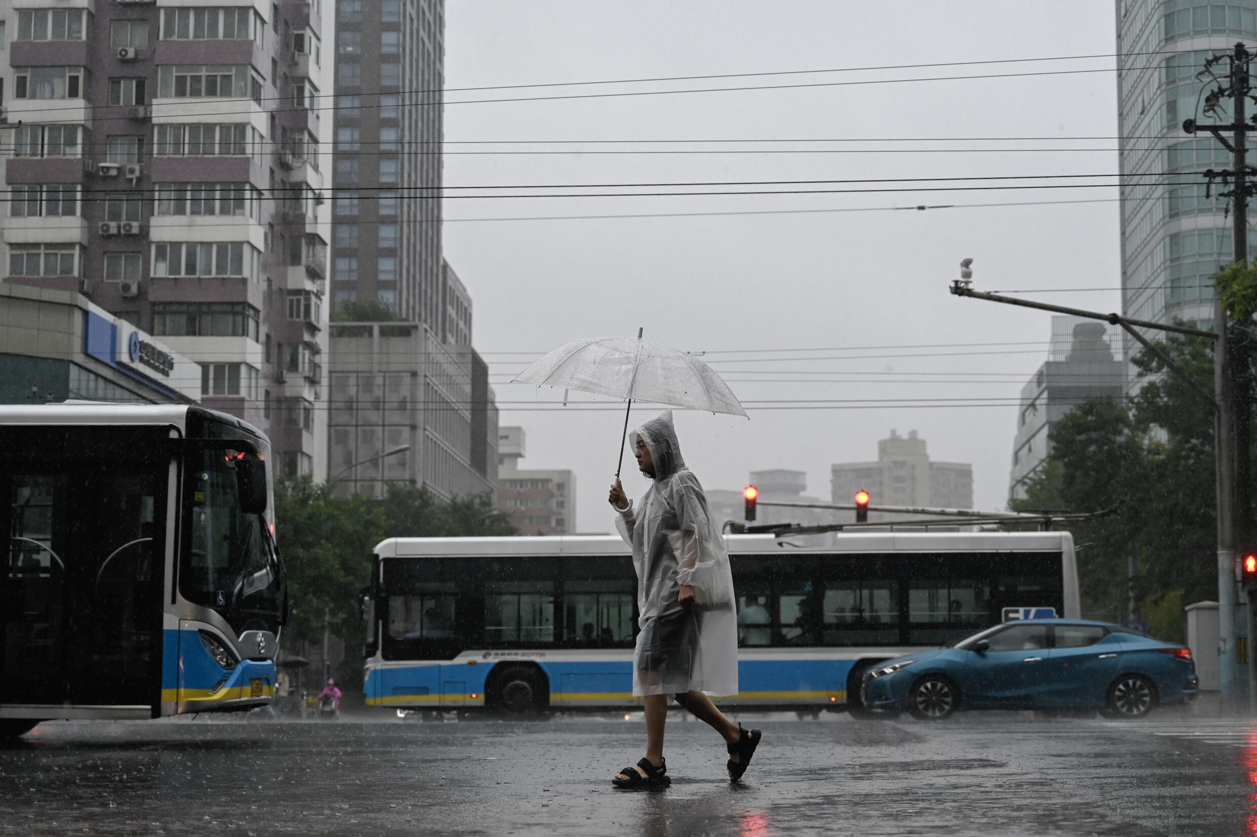 Beijing on alert with two killed as heavy rain batters north China
