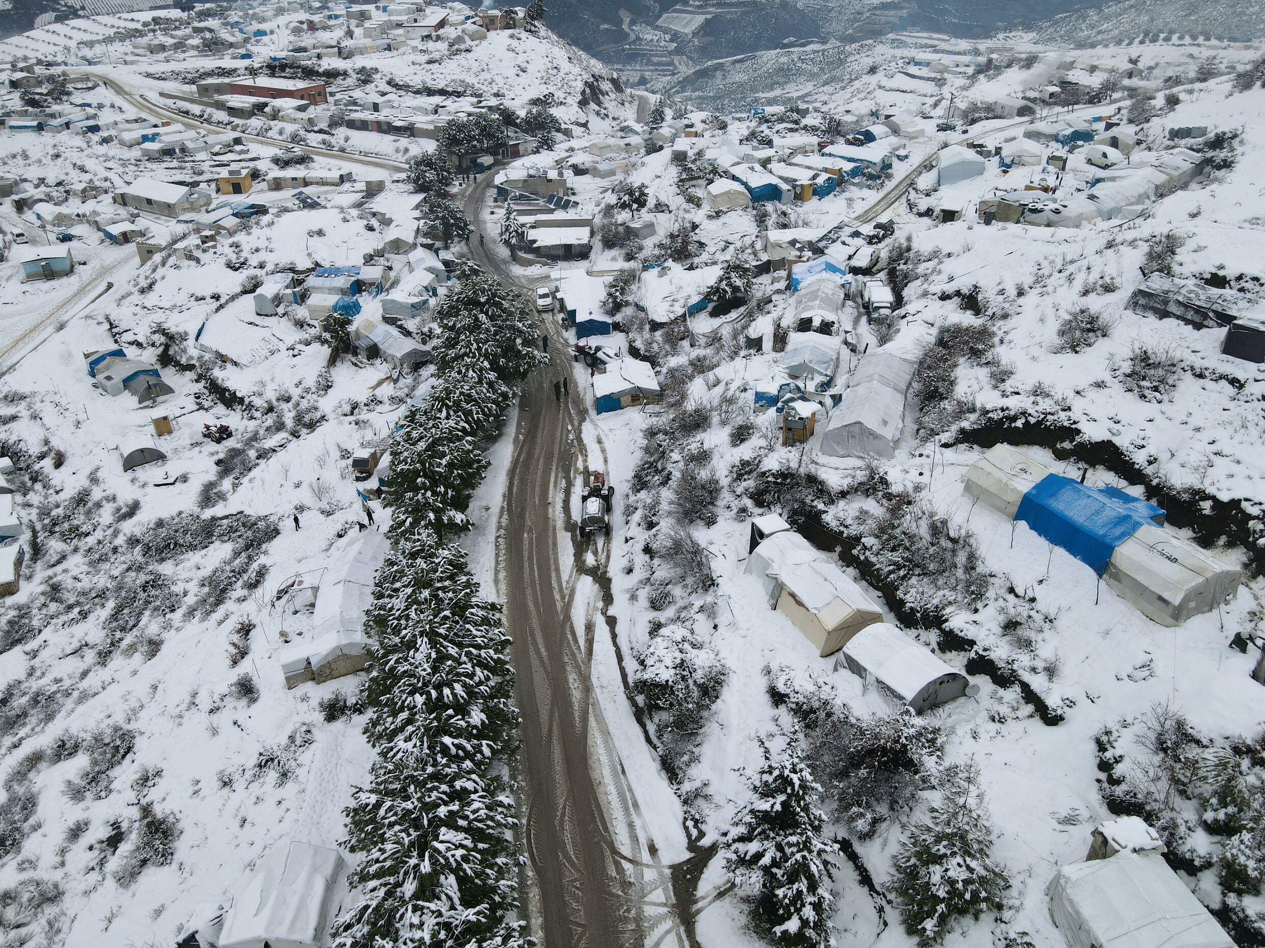 Rare Mideast snow brings Jerusalem joy, misery for Syria refugees