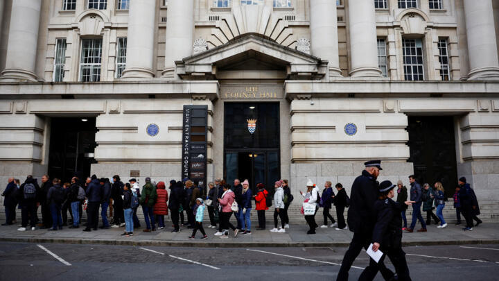 King Charles visits Wales as London queue hits 24-hour wait time