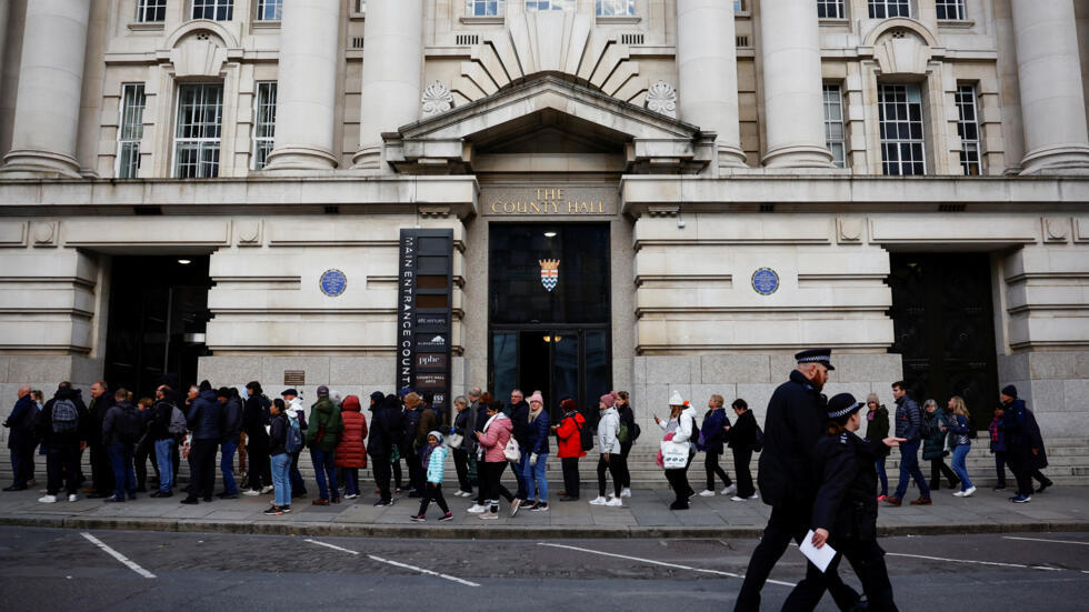 King Charles visits Wales as London queue hits 24-hour wait time