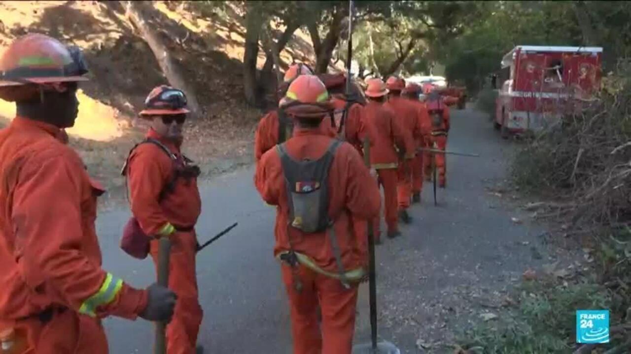 Fire-scorched Los Angeles gets a reprieve as winds drop
