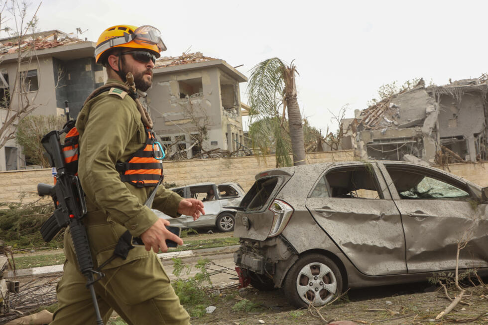 Israelis emerge from shelters to devastation after Iran attacks