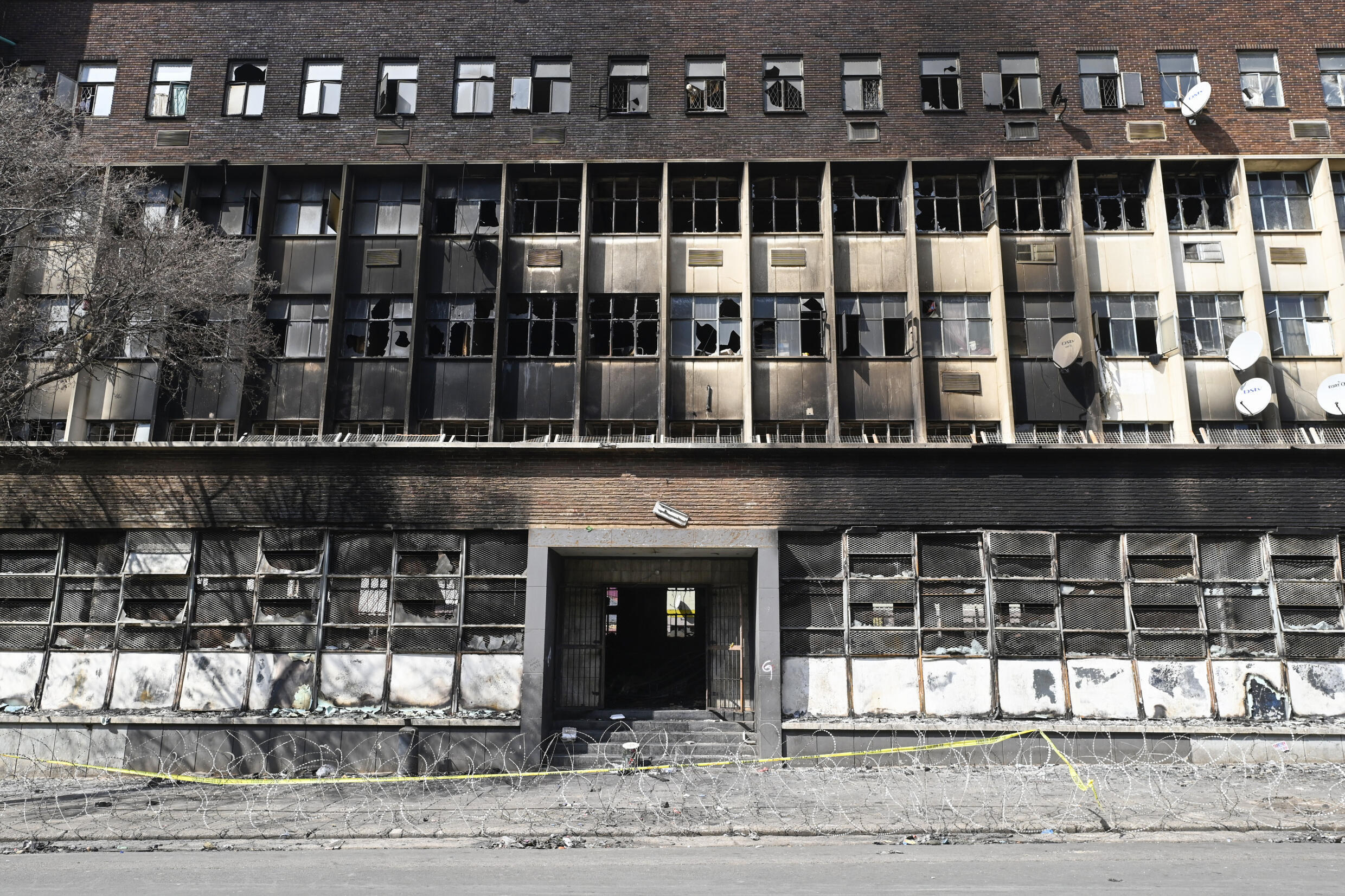 Joburg fire toll rises as S.Africa debates 'hijacked' buildings