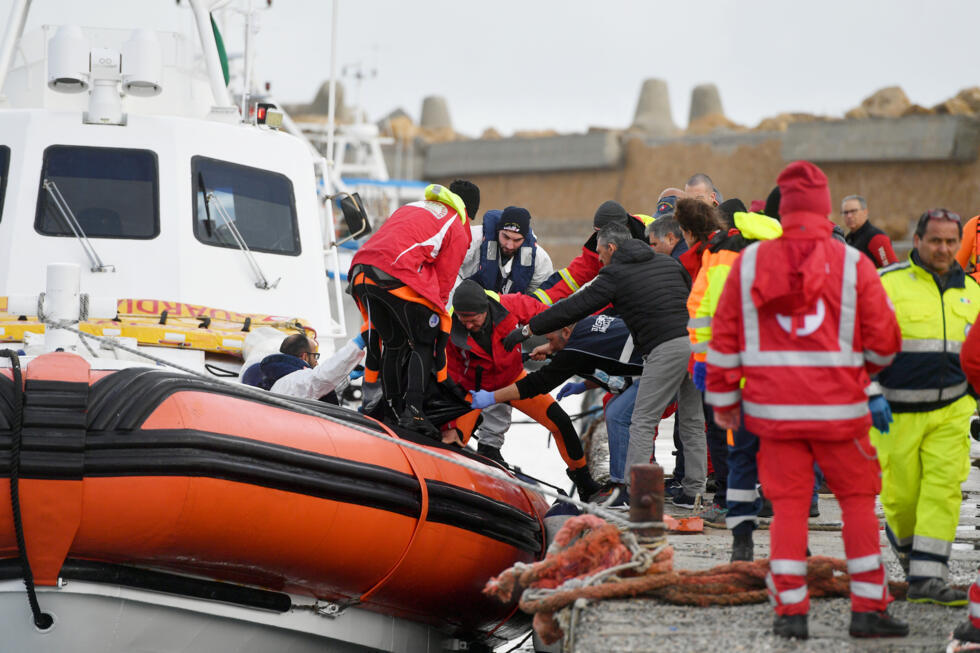 Italy coastguard combs beaches for bodies after shipwreck