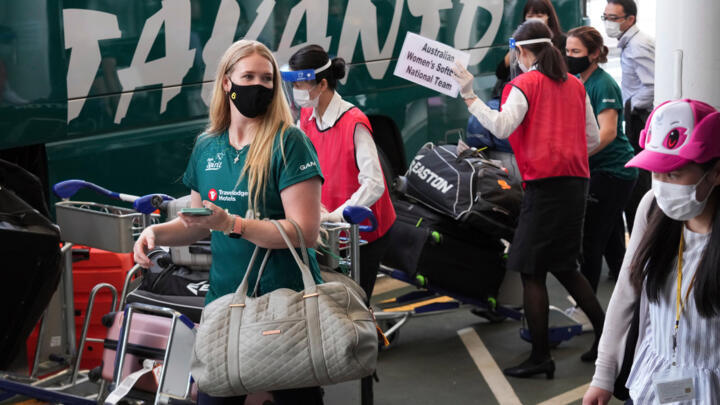 Australian softball team first to arrive in Japan for Olympics
