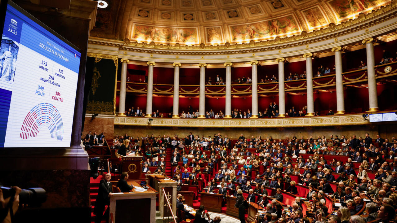 French parliament adopts toughened immigration law backed by far right