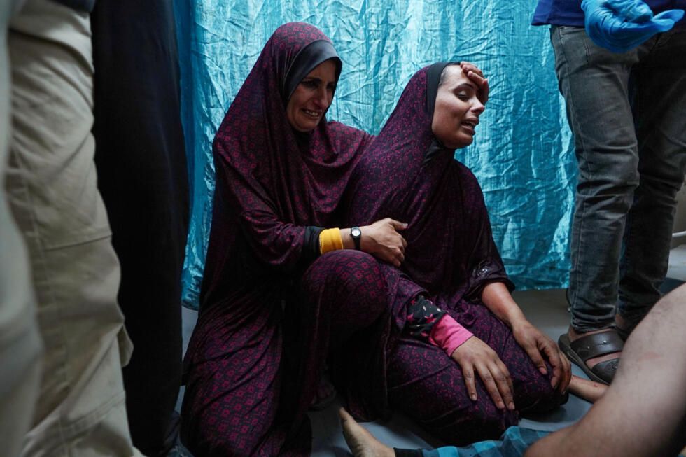 Civil defence says 21 dead in new strike on Gaza camp that Israel denies