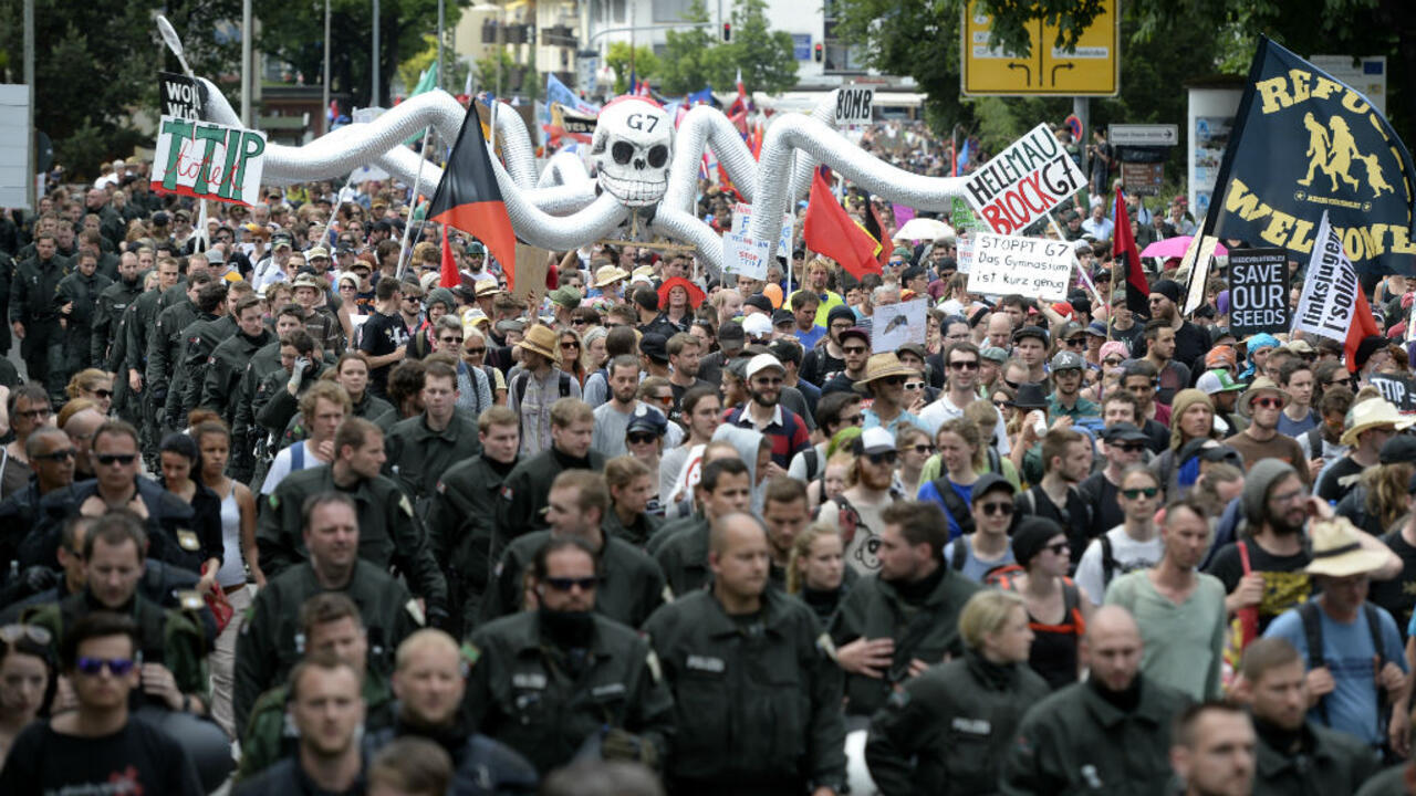 Protesters clash with police ahead of G7 summit
