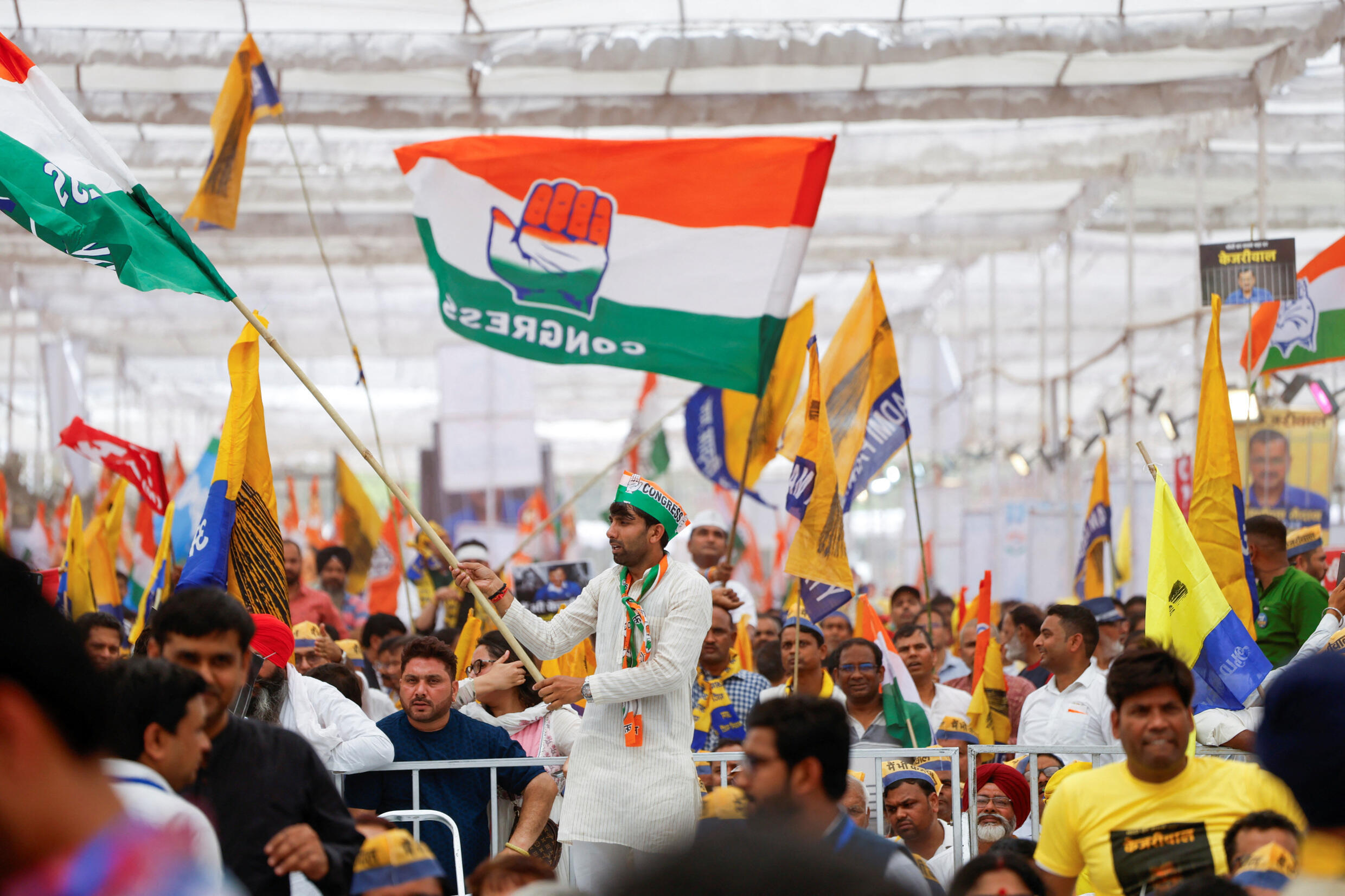 India's opposition parties unite in protest over arrest of Modi critic ...