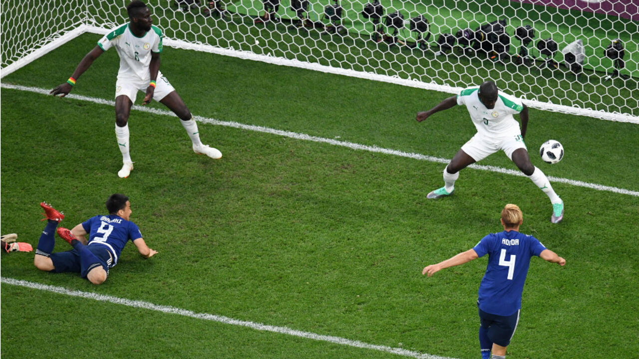 Japan hold Senegal to 2-2 draw with late equaliser