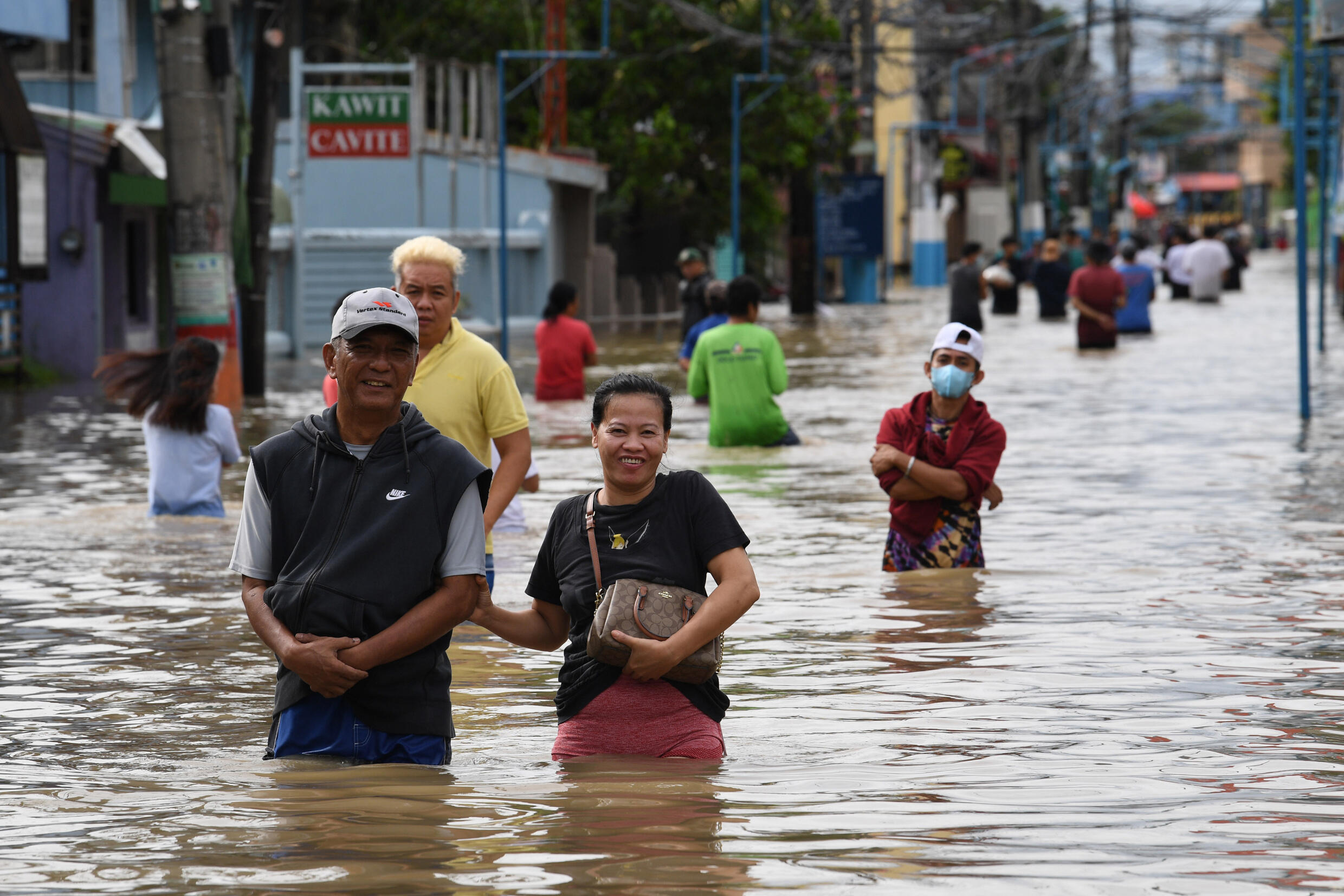 Tropical storm batters Philippines capital before exit