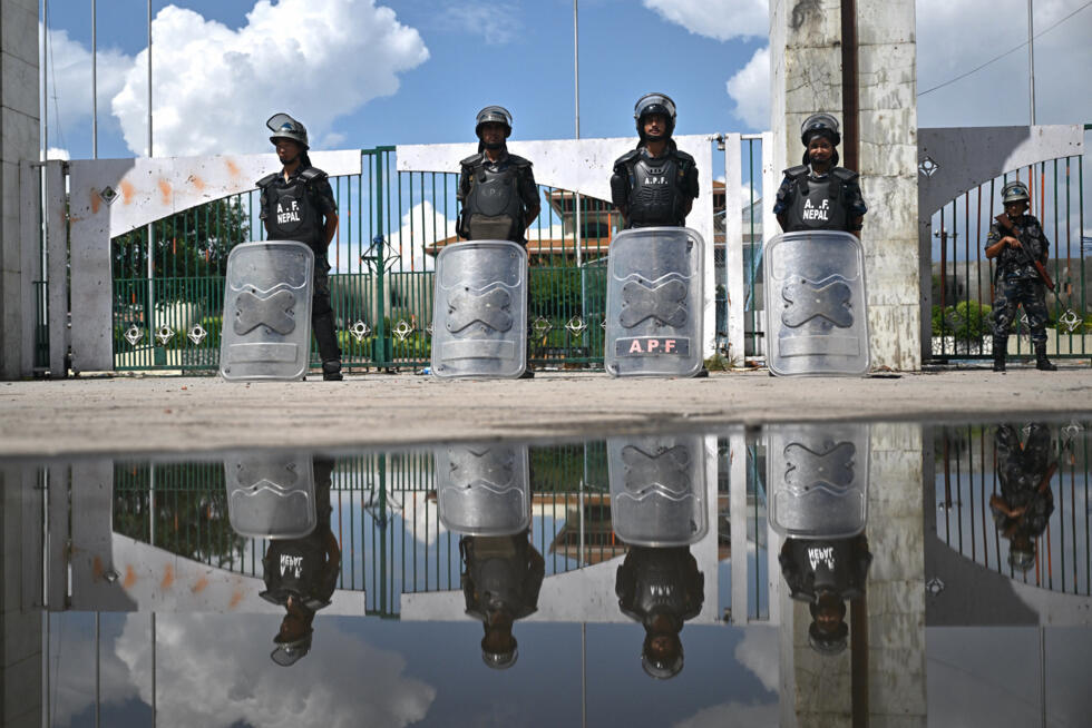 Nepal returns to calm as first woman PM takes charge, visits wounded