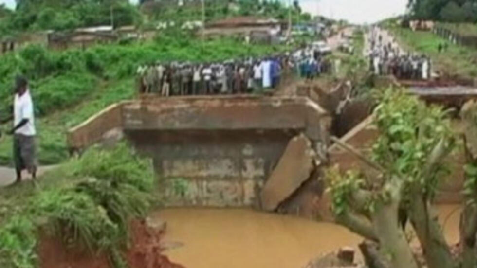 Over 100 dead after heavy rains burst dam