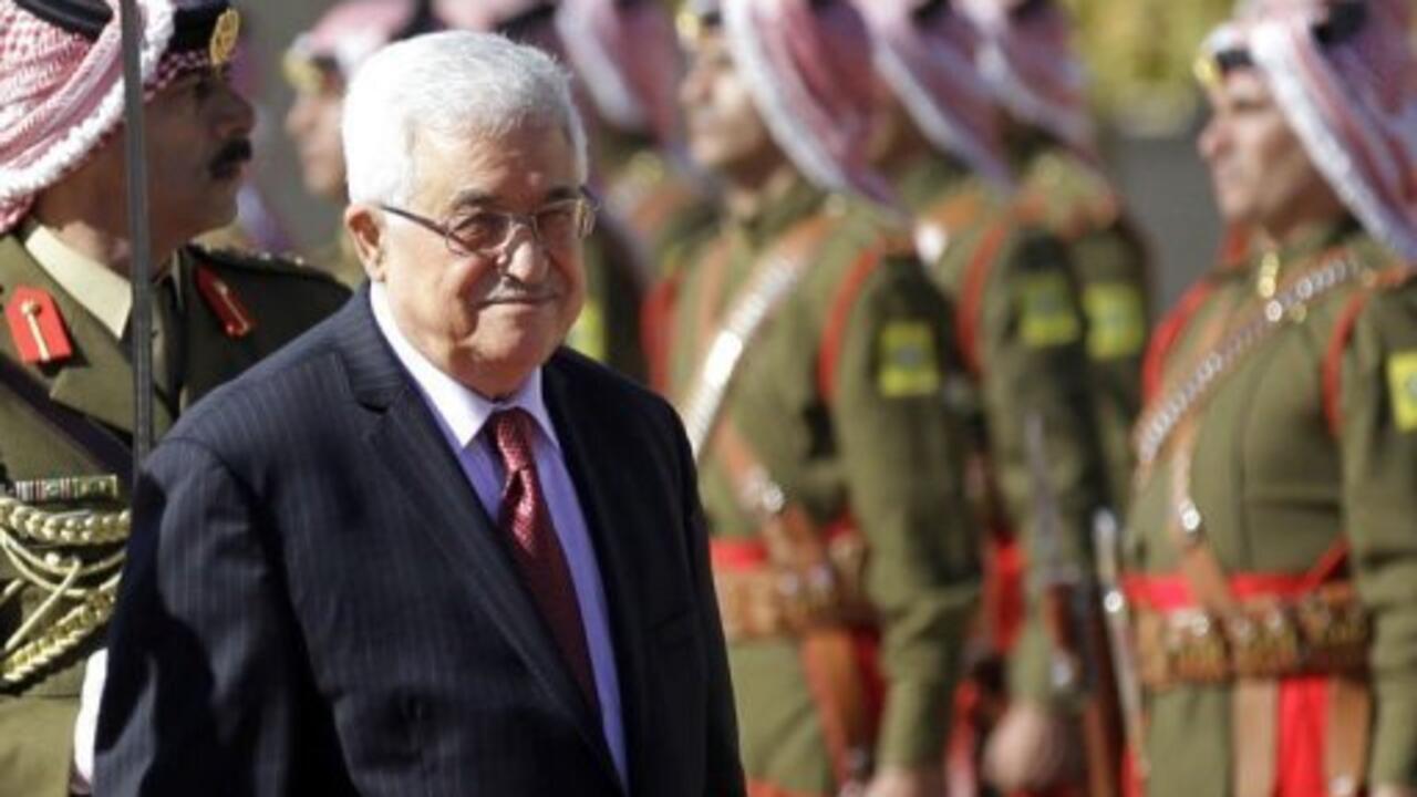 Abbas returns home after historic UN vote