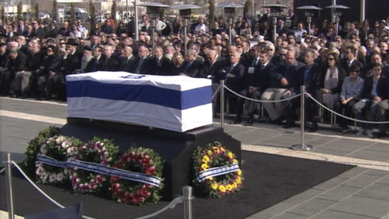Israel’s ‘unwavering’ Sharon honoured at burial