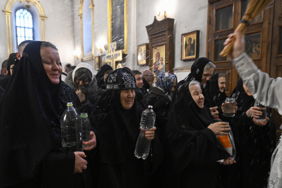 'No matter the faith': east Ukraine marks Epiphany despite war divide