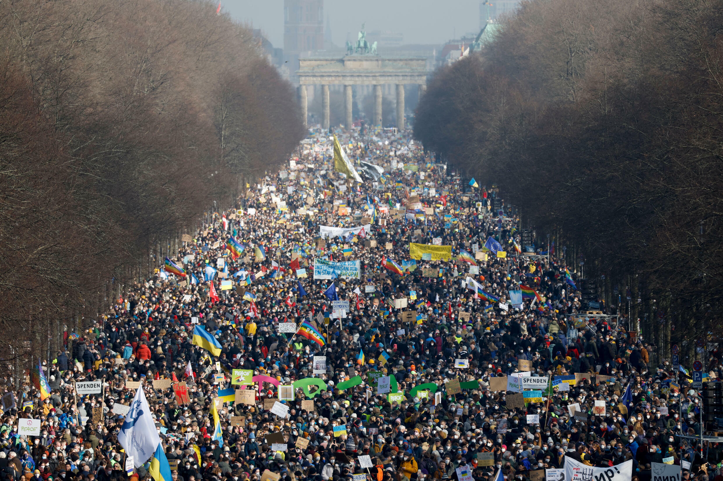 Tired and emotional, Ukrainians arrive by train in Berlin