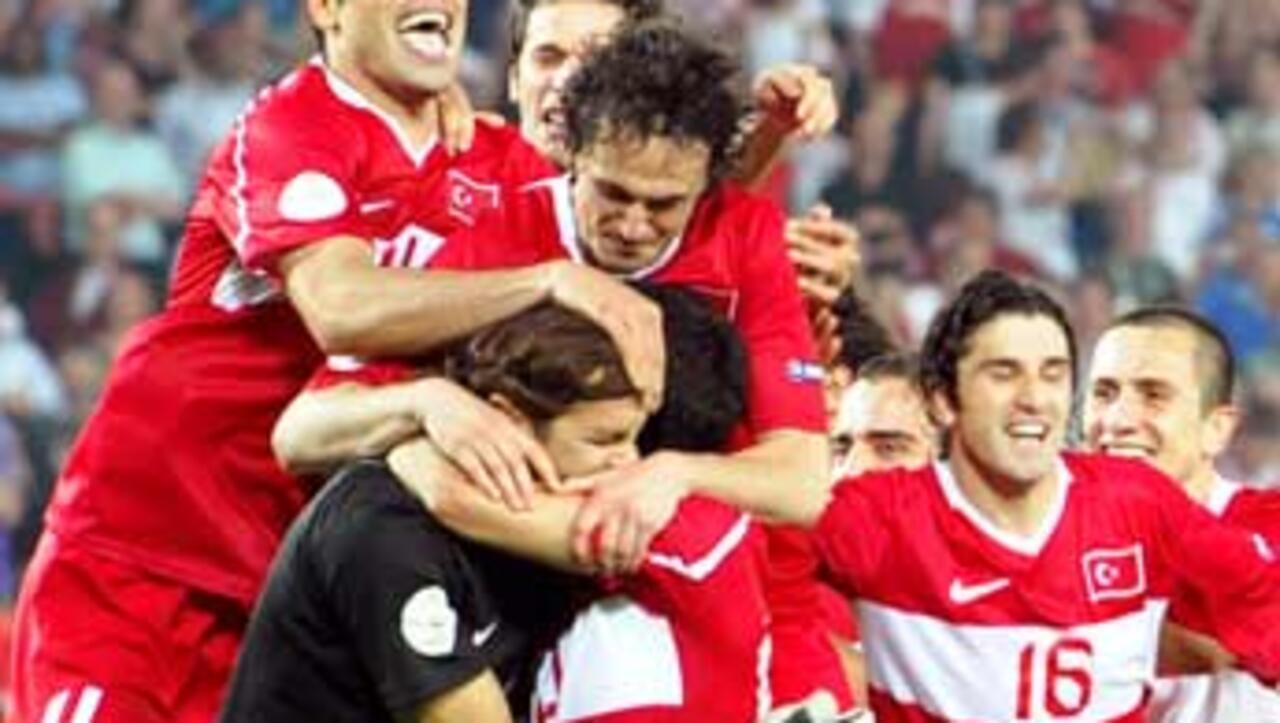 Back from the dead, Turkey win shootout to grab semis