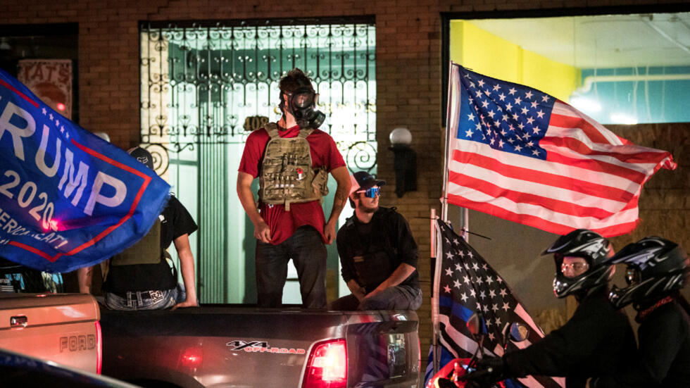 Trump and Biden clash after street protests in Portland turn deadly