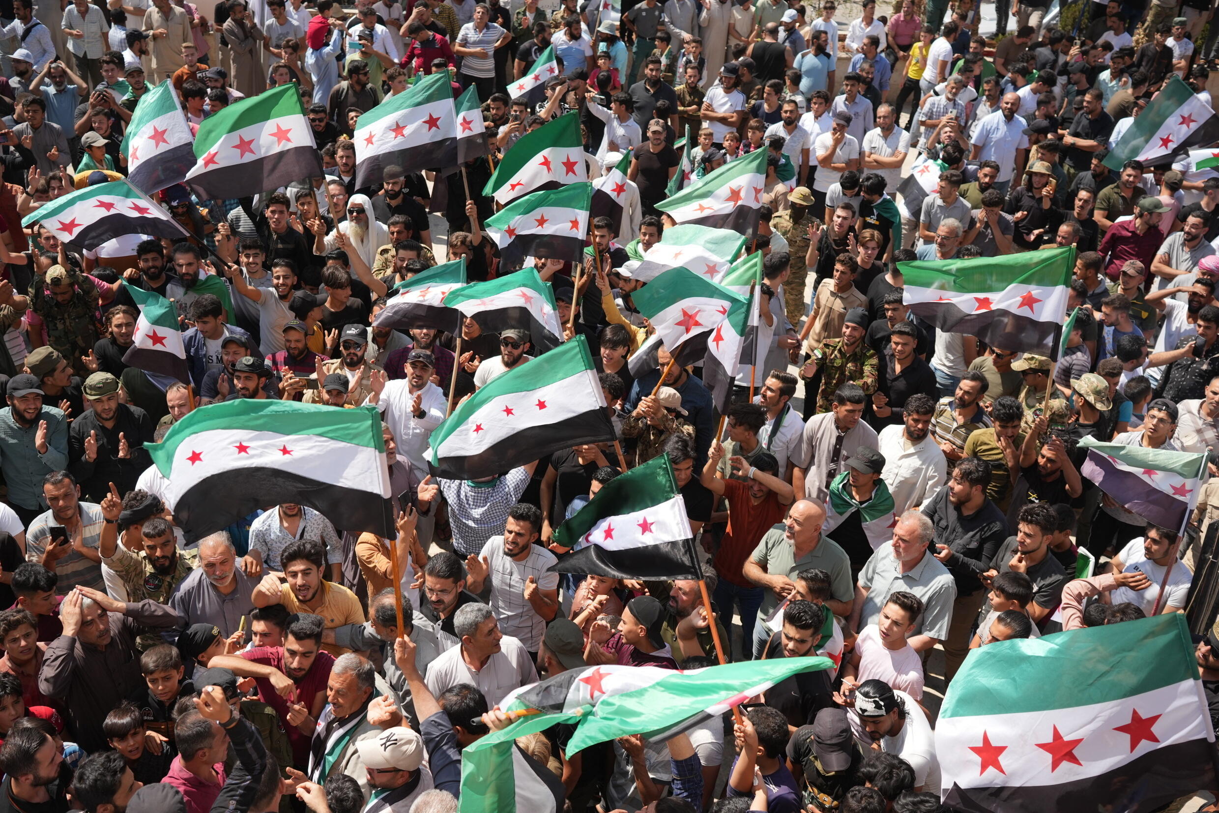 Anti-government protests take hold in southern Syria
