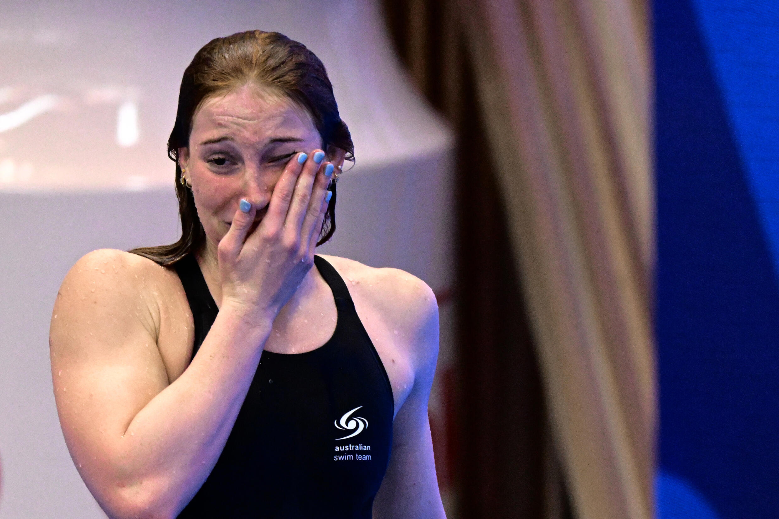 O'Callaghan breaks record as Marchand adds more swimming gold