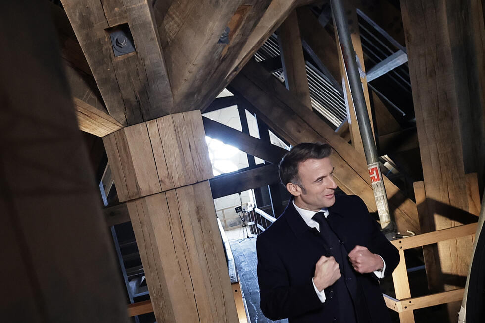 Political storm clouds Macron's Notre Dame glory