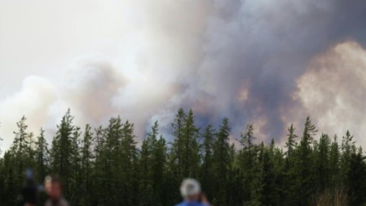 Several thousand evacuated as Canada wildfire nears oil facilities