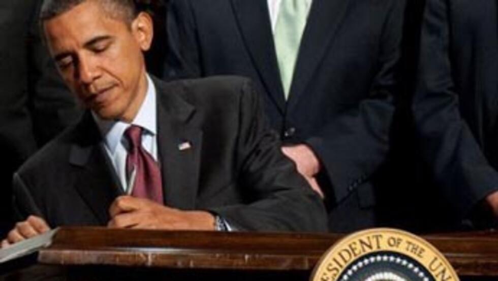 President Obama signs landmark finance reform into law