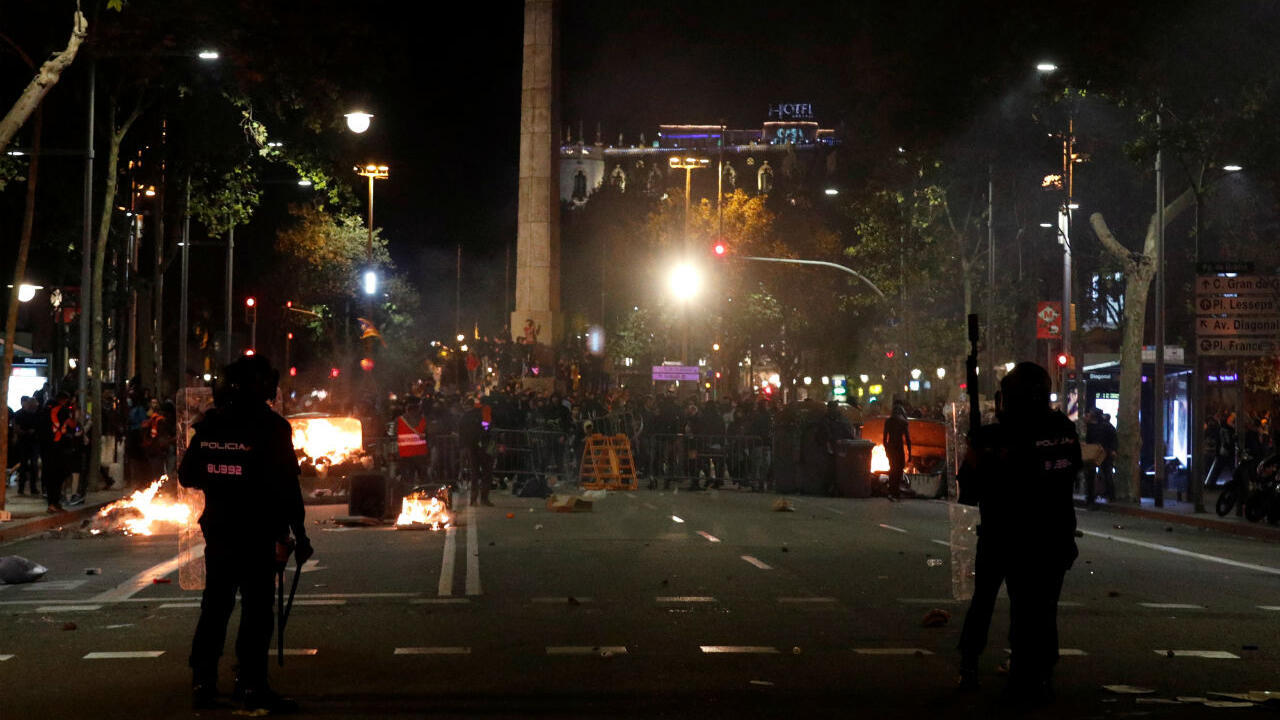 Clashes rock Barcelona as Catalan separatists vent anger at jail sentences