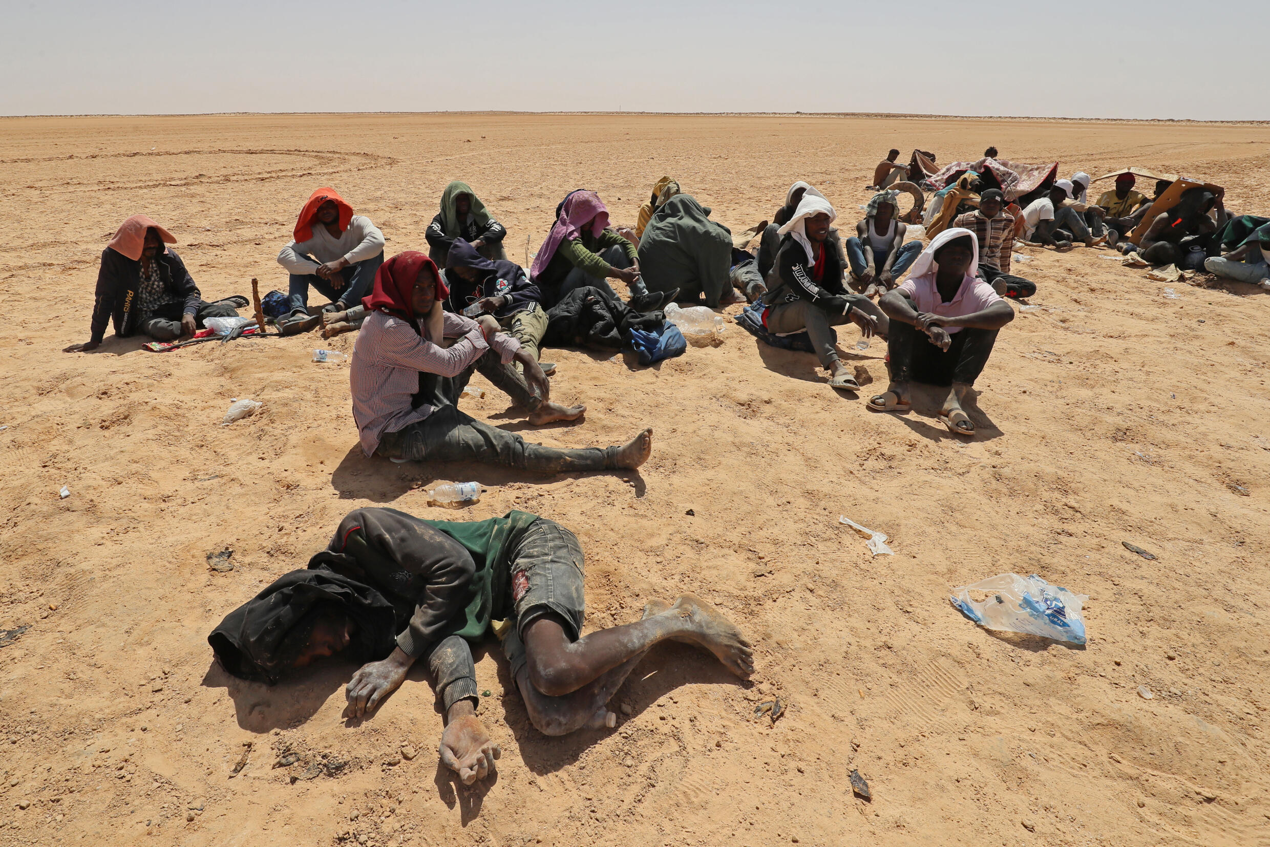 Libya border guards rescue migrants in desert near Tunisia