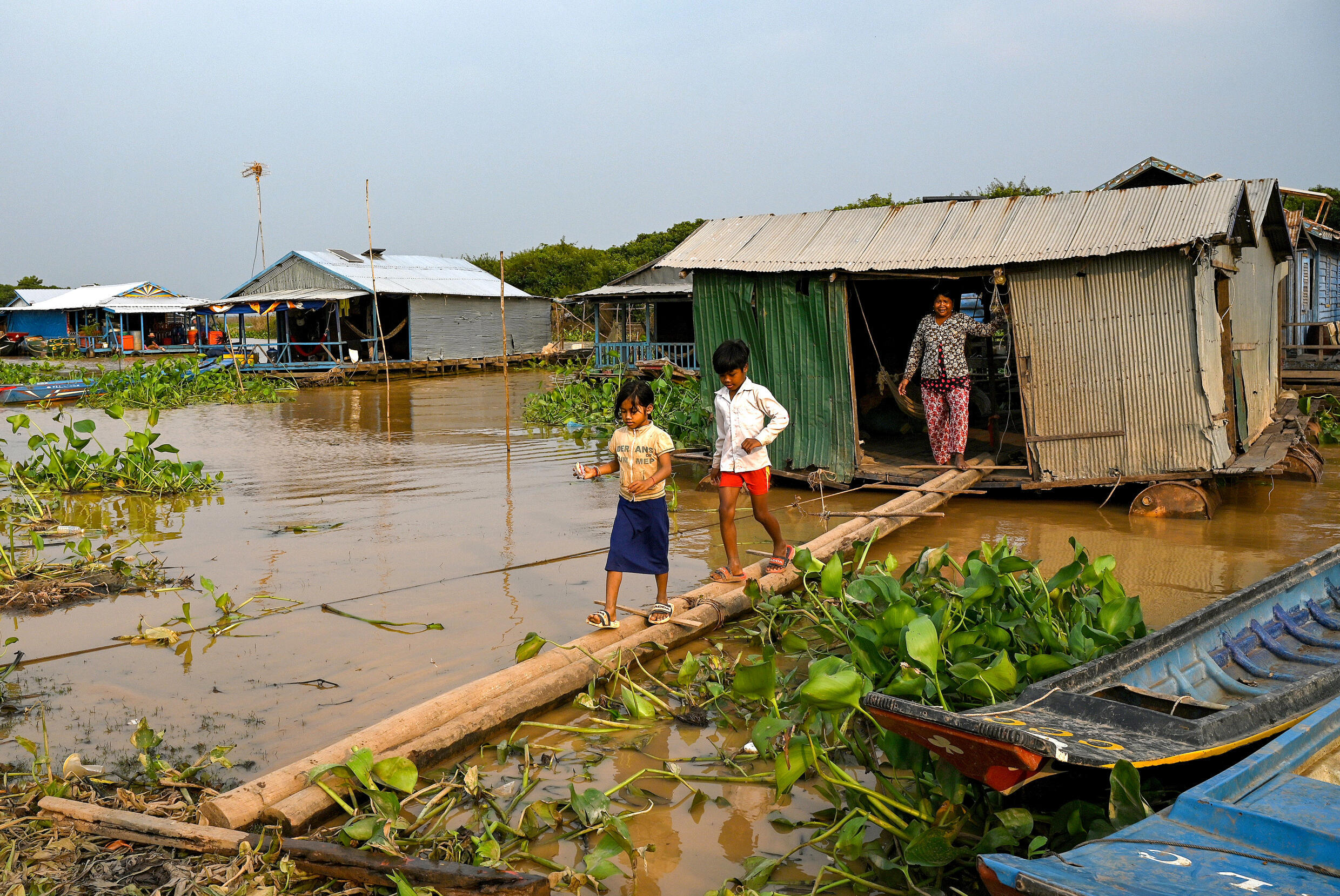 'Floating toilets' help Cambodia's lake-dwelling poor