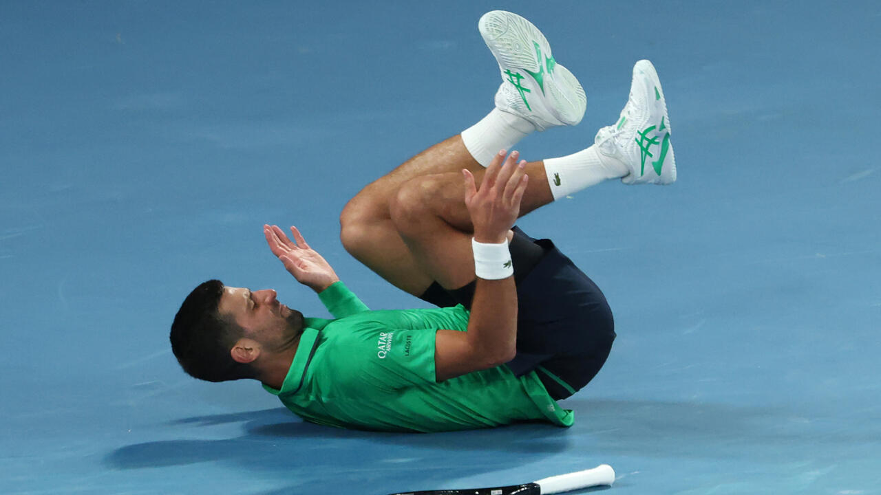 Djokovic wins record 400th Slam match to power on in Australia