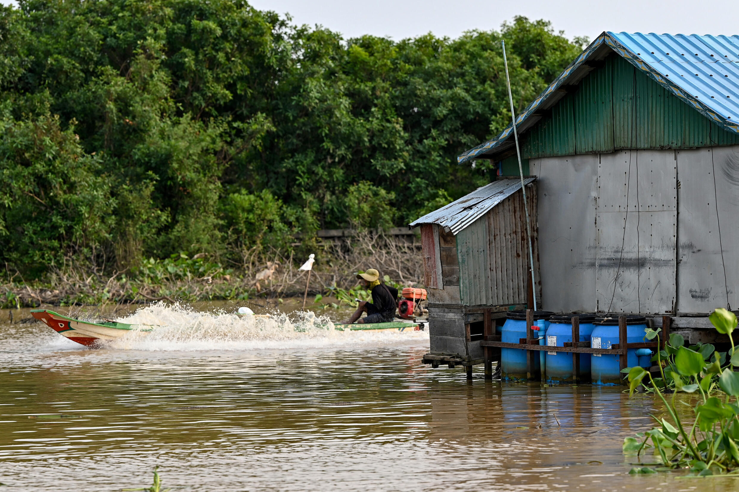 'Floating toilets' help Cambodia's lake-dwelling poor