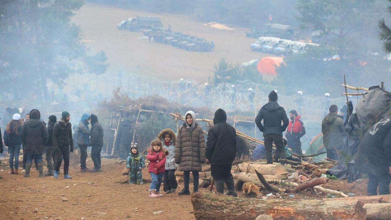 Polish police say group of 50 migrants broke through border with Belarus