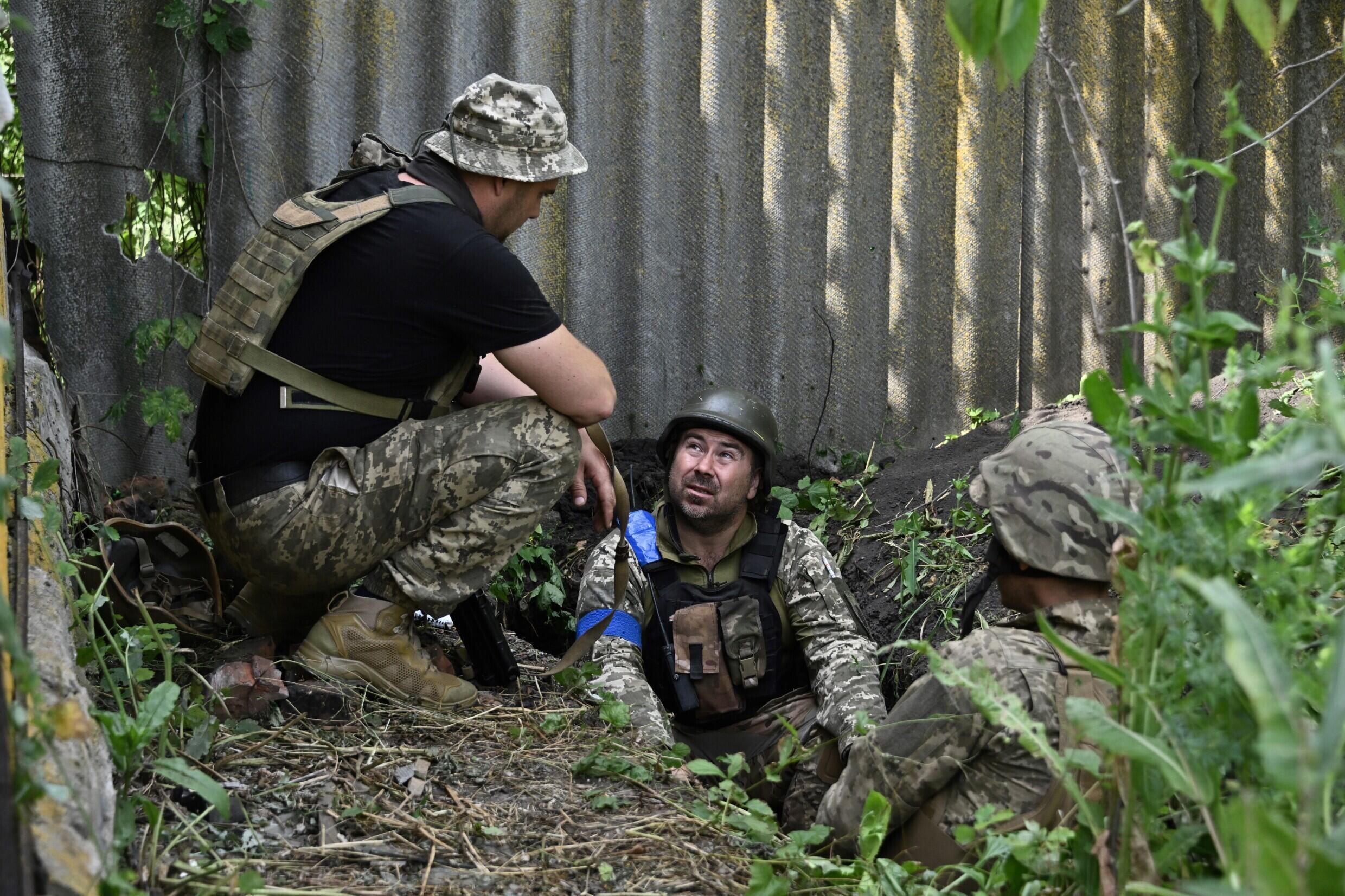 Tank rounds and war trophies as Ukraine shows retaken villages