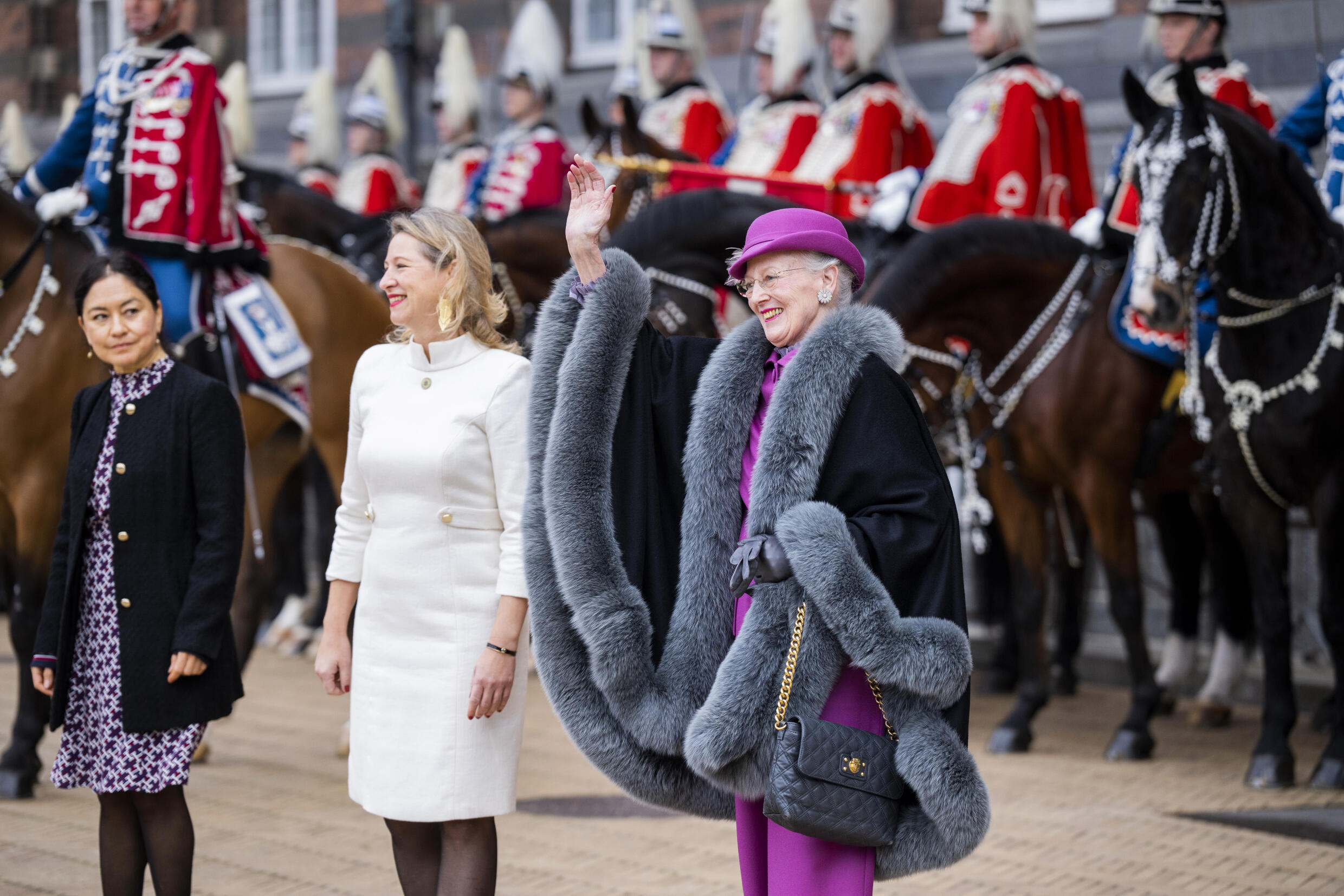 Denmark's queen delights jubilee crowds after family spat