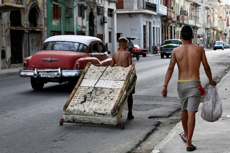 With no money or fuel, Cuban fishermen improvise on floating rafts