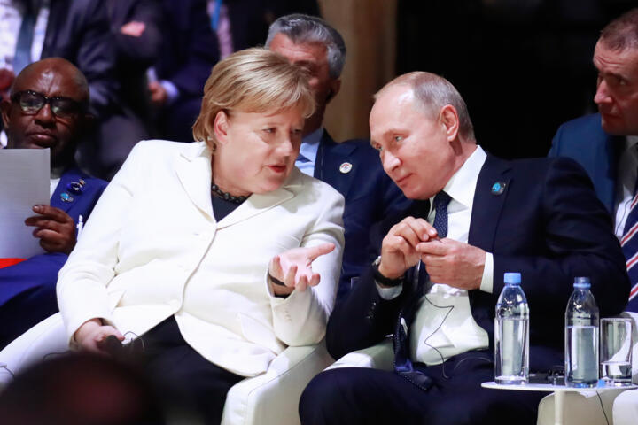 No regrets: Merkel looks back at refugee crisis, Russia ties