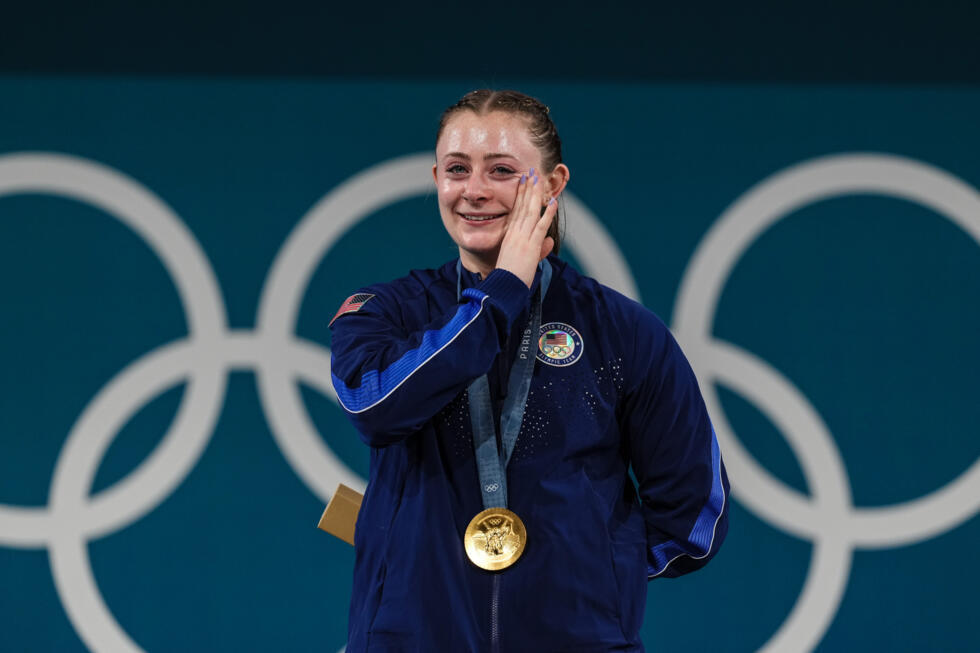 'Man from Mars' Nasar wins Olympic weightlifting gold with new world record