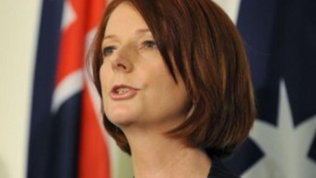 Australia's PM Gillard survives leadership challenge