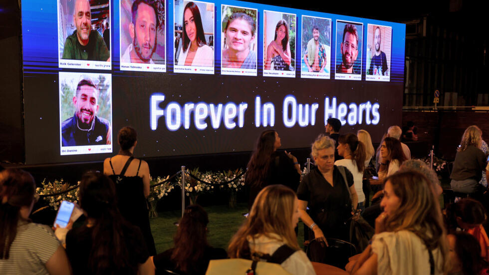 Thousands gather in Tel Aviv to mark anniversary of October 7 attack