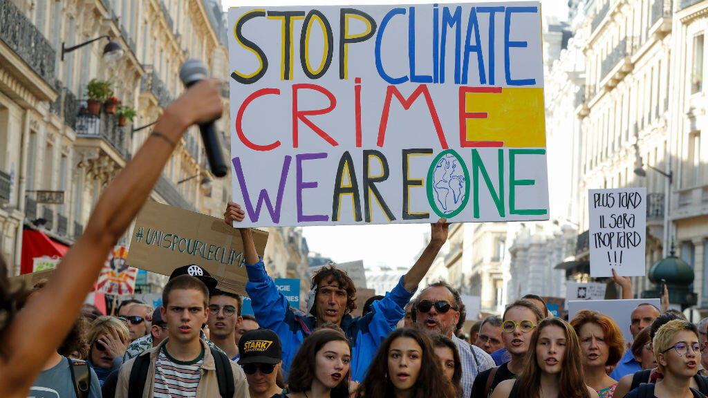 Thousands march across France to demand climate action
