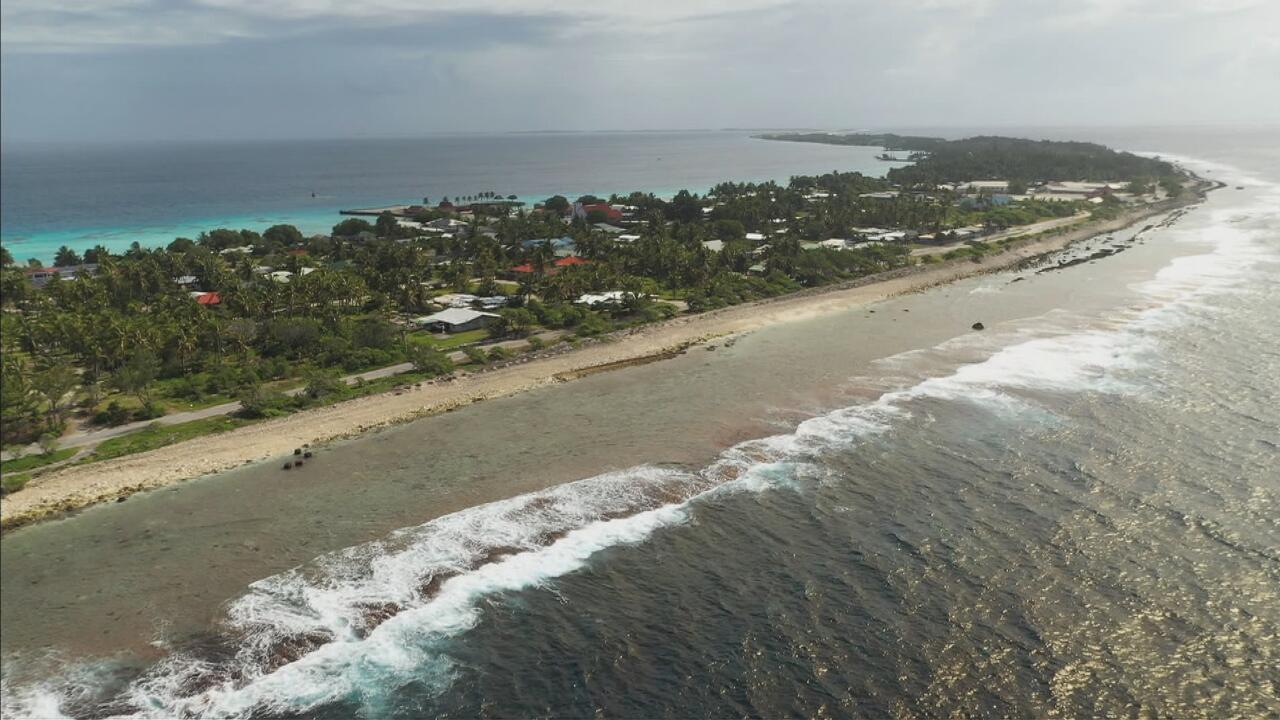 Rising tides: French Polynesian atoll threatened by climate change ...