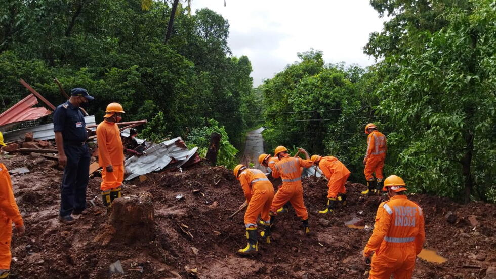 Rescue teams search sludge, debris as India floods' death toll mounts
