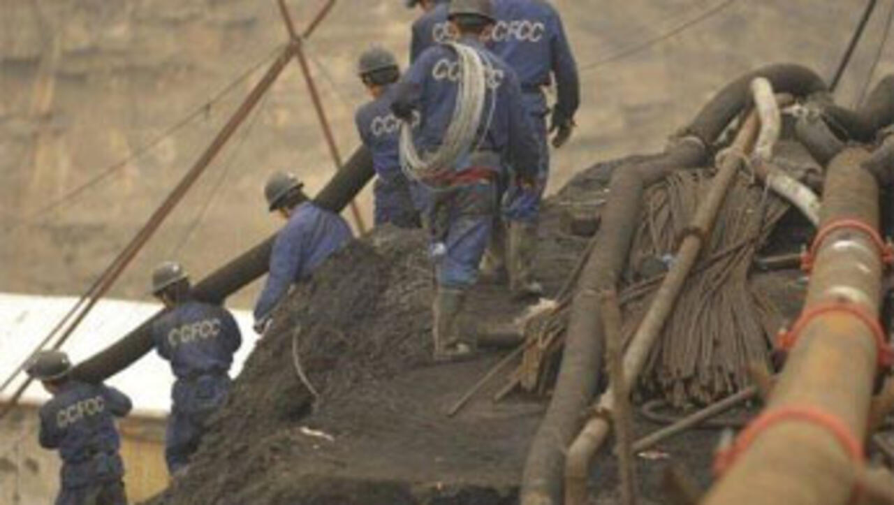 Signs of life heard in mine with 153 trapped workers