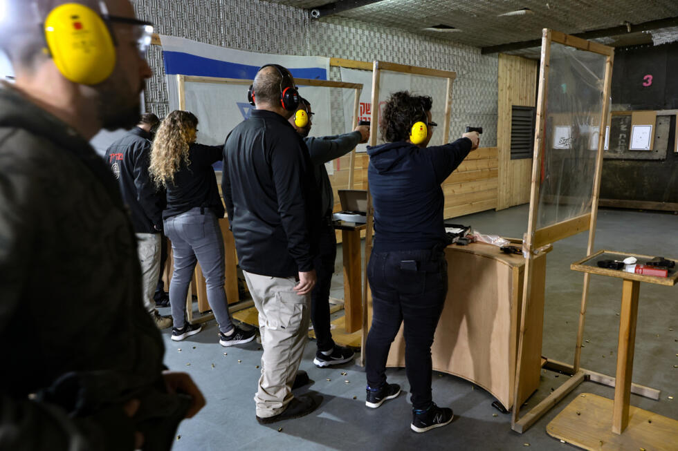 Fearing Palestinian attacks, Israelis seek security in guns